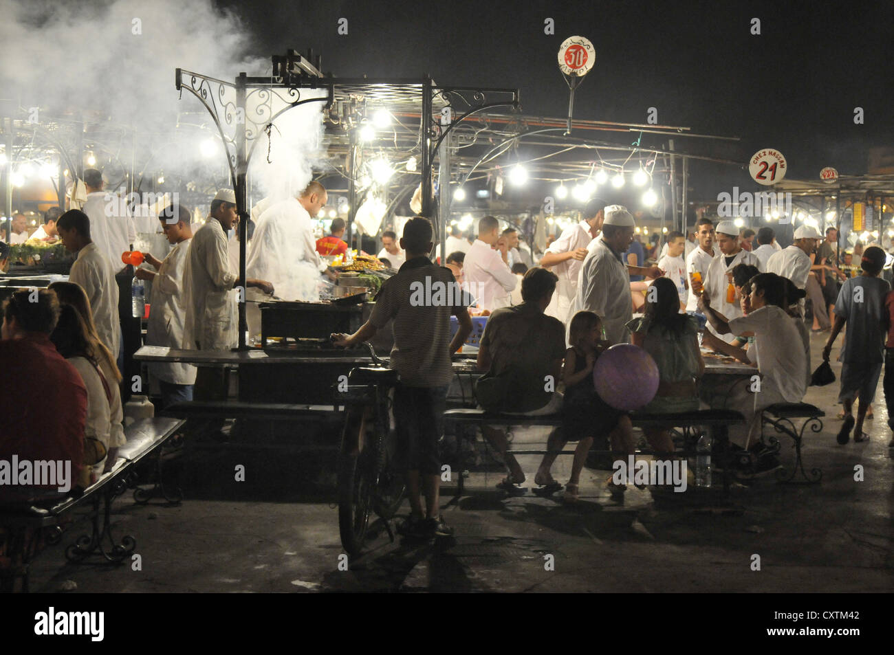 Smoke rises above the food stalls in the Djemma El Fna Square in the ...