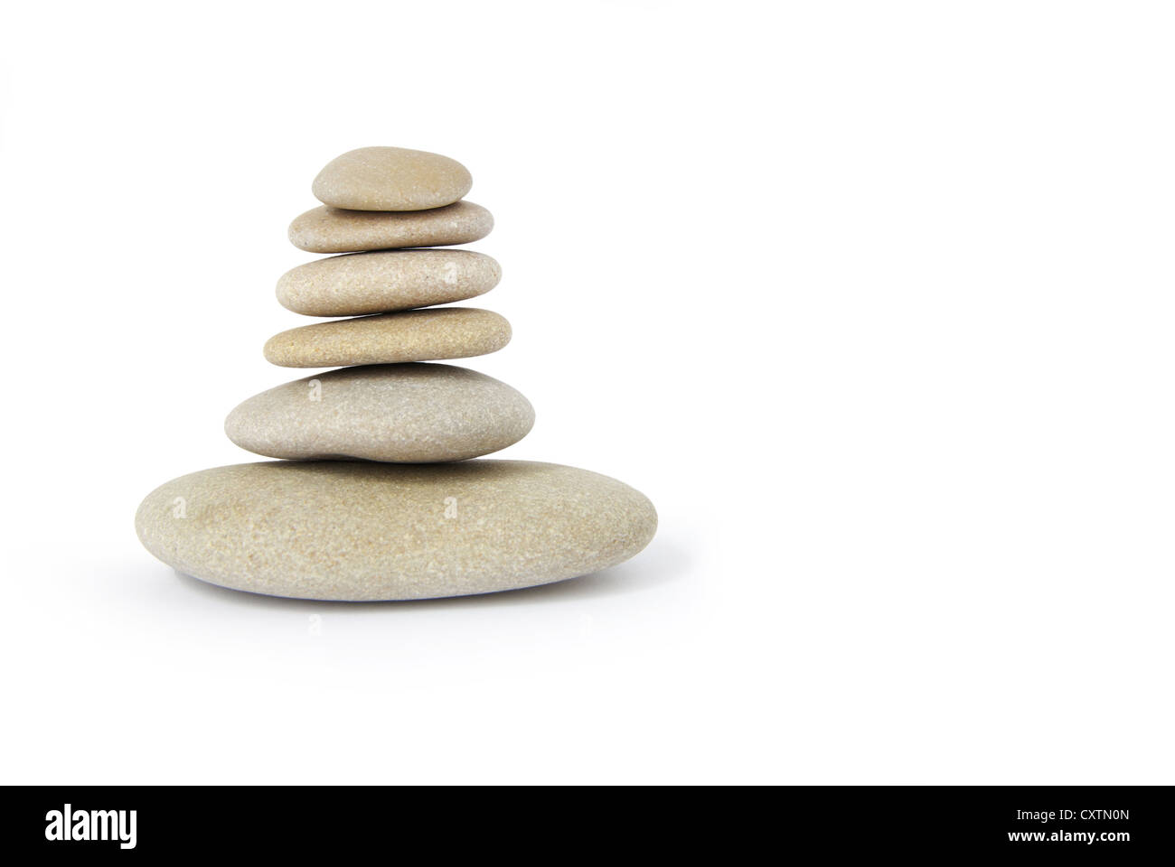Stack of balanced stones on a white background Stock Photo - Alamy