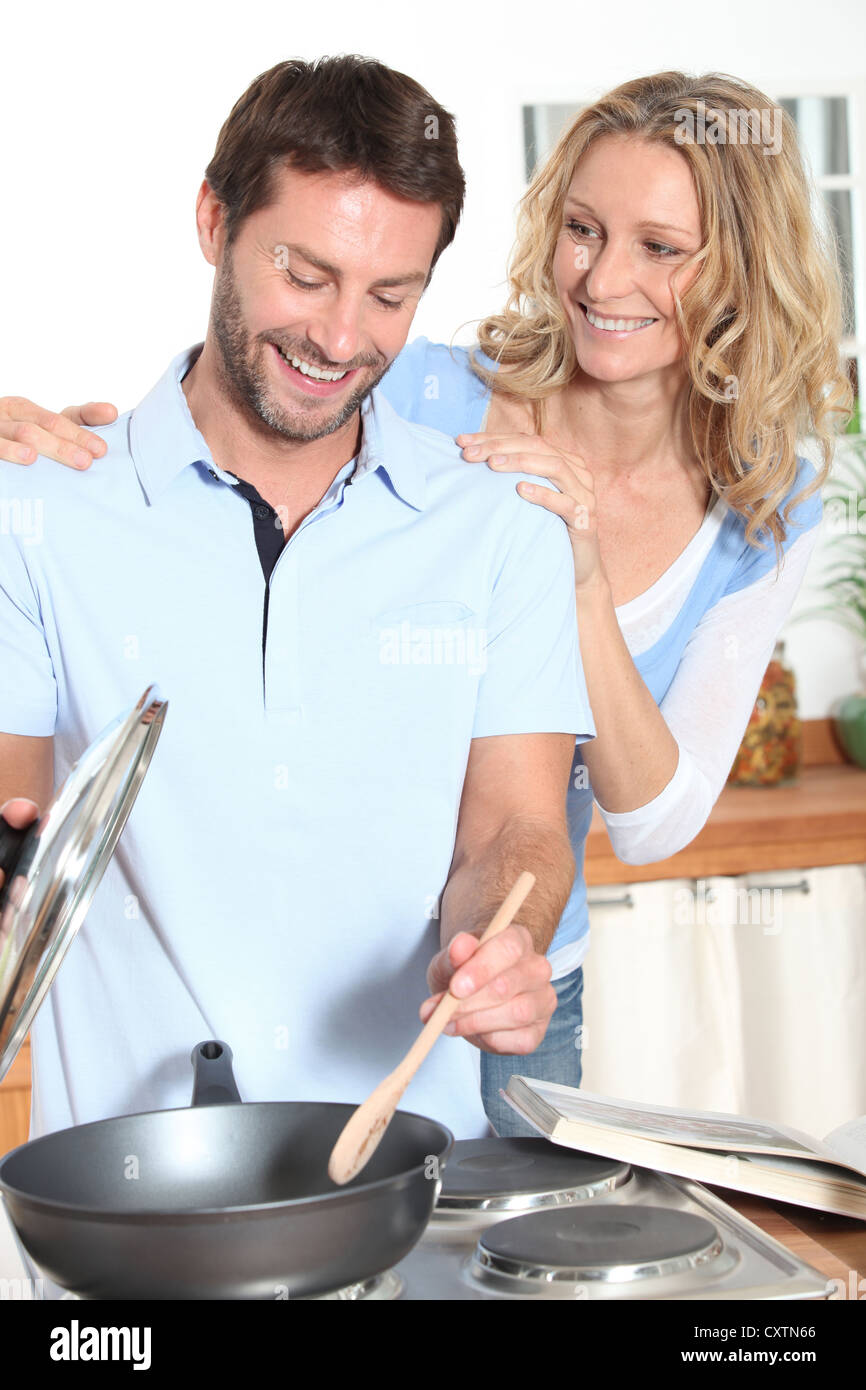 Man cooking pan lid hi-res stock photography and images - Alamy