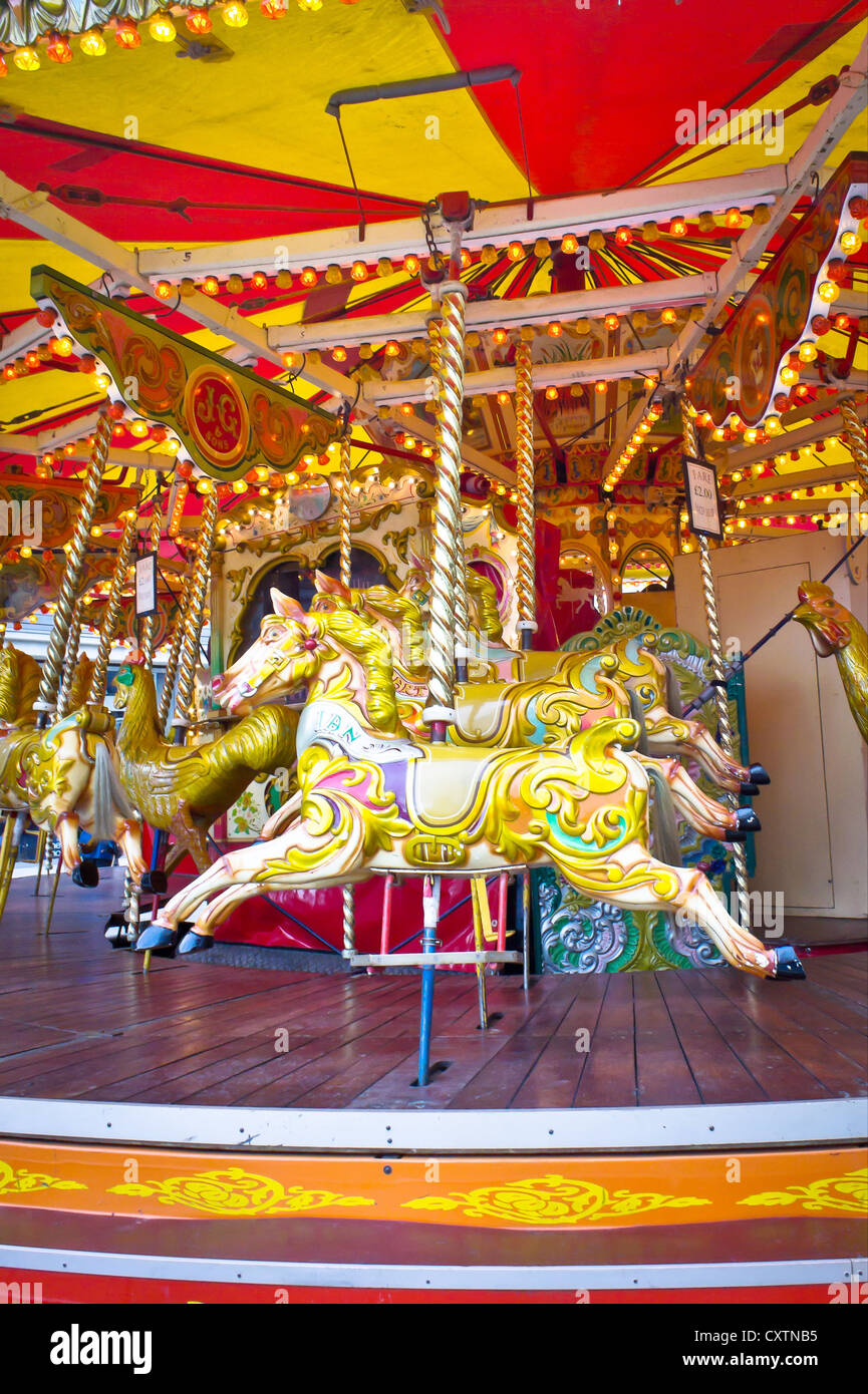 A carousel ride at a fair ground Stock Photo - Alamy