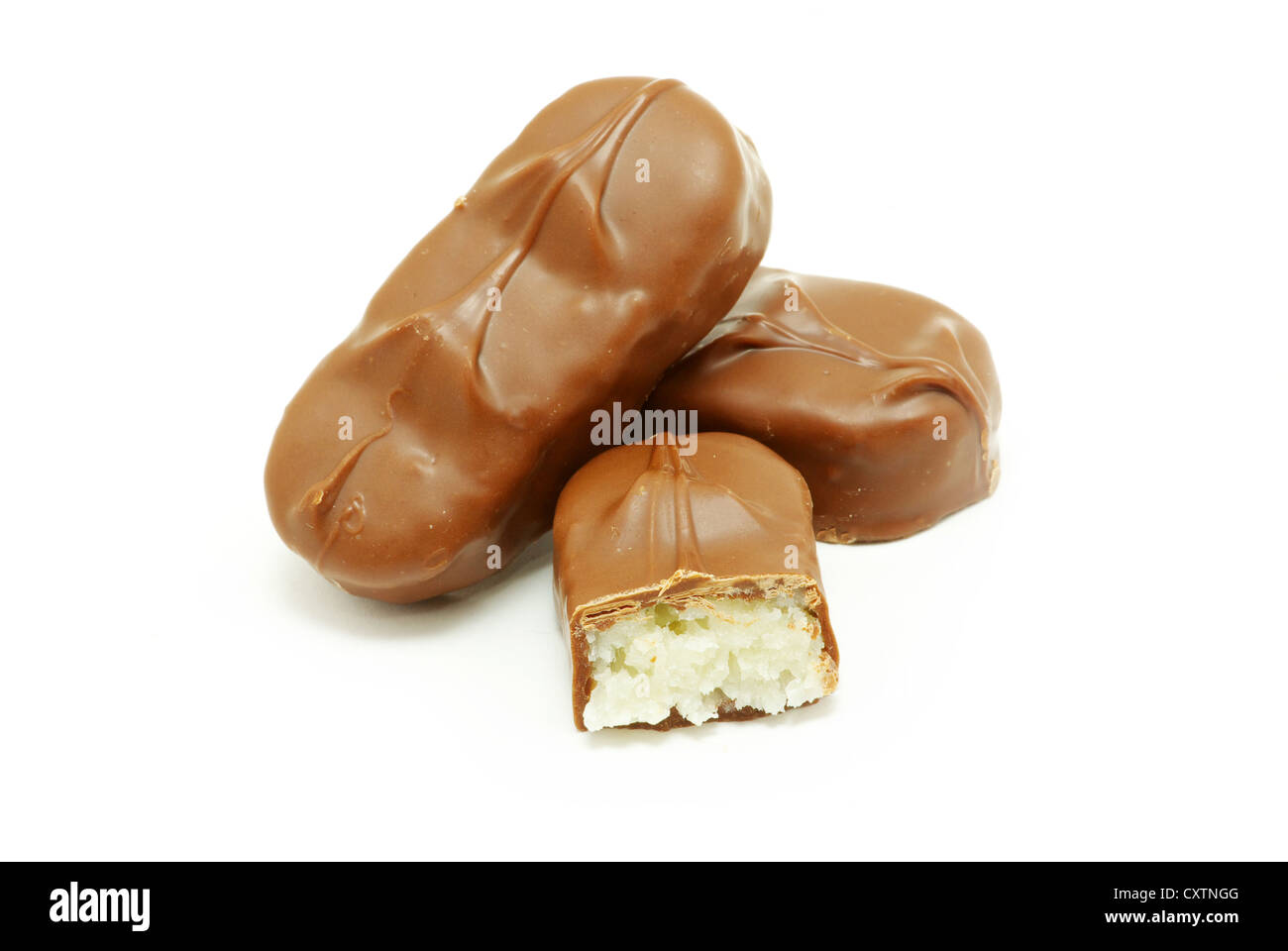 Delicious chocolate confetti isolated on white Stock Photo - Alamy