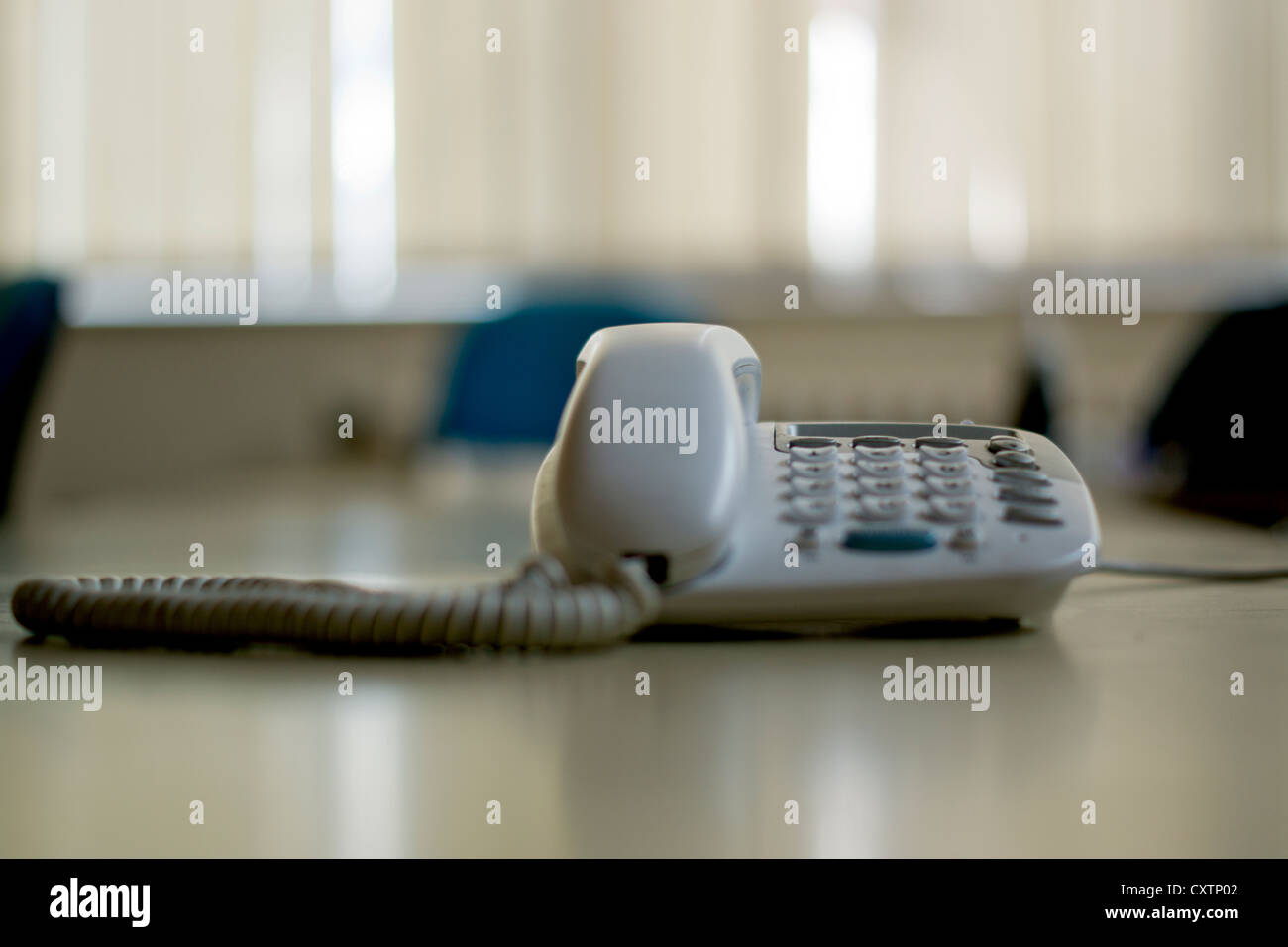 Telephone on a office desk Stock Photo - Alamy