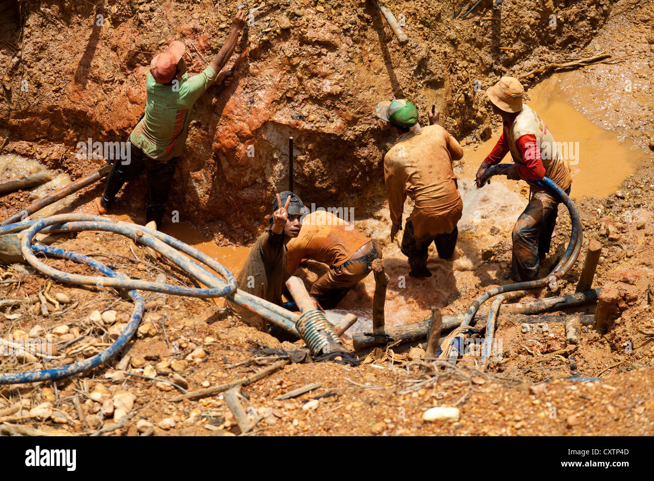 Diamond Diggers in a Pit on the Diamond Fields of Cempaka, Indonesia ...