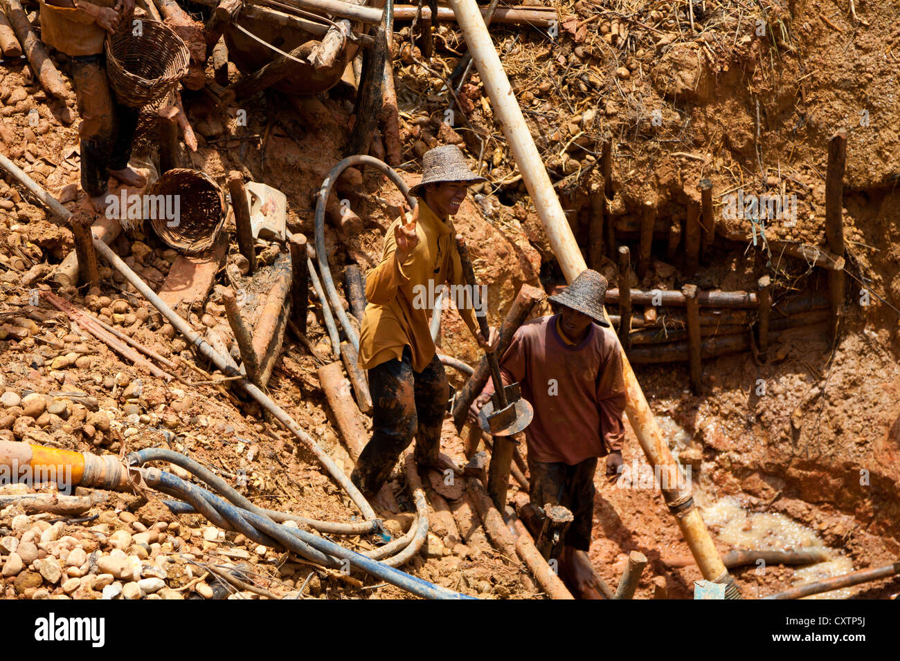 Diamond Diggers in a Pit on the Diamond Fields of Cempaka, Indonesia ...
