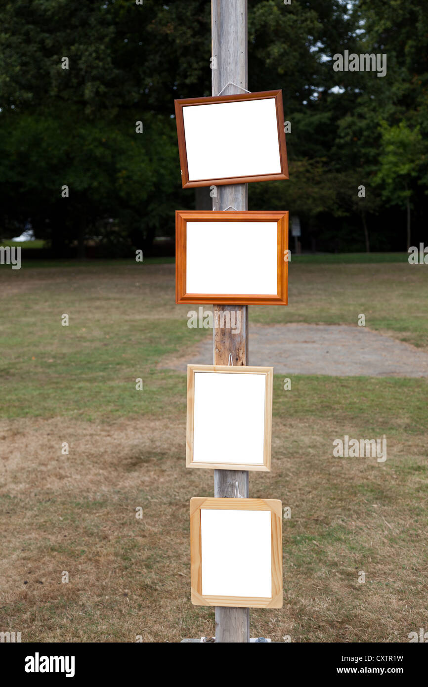 Picture Frame on wooden pole close up Stock Photo - Alamy