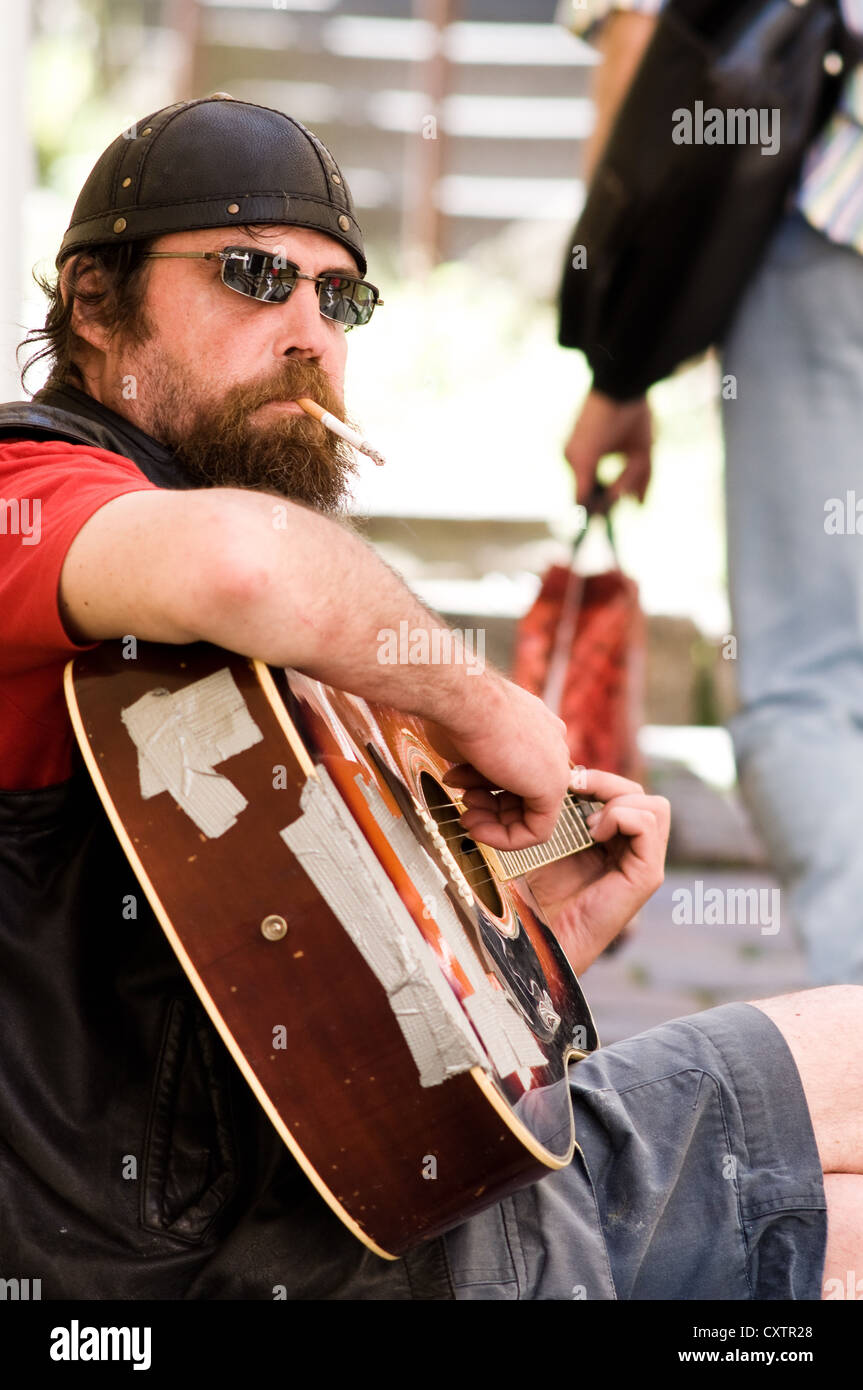 Playing guitar while smoking hi-res stock photography and images - Alamy