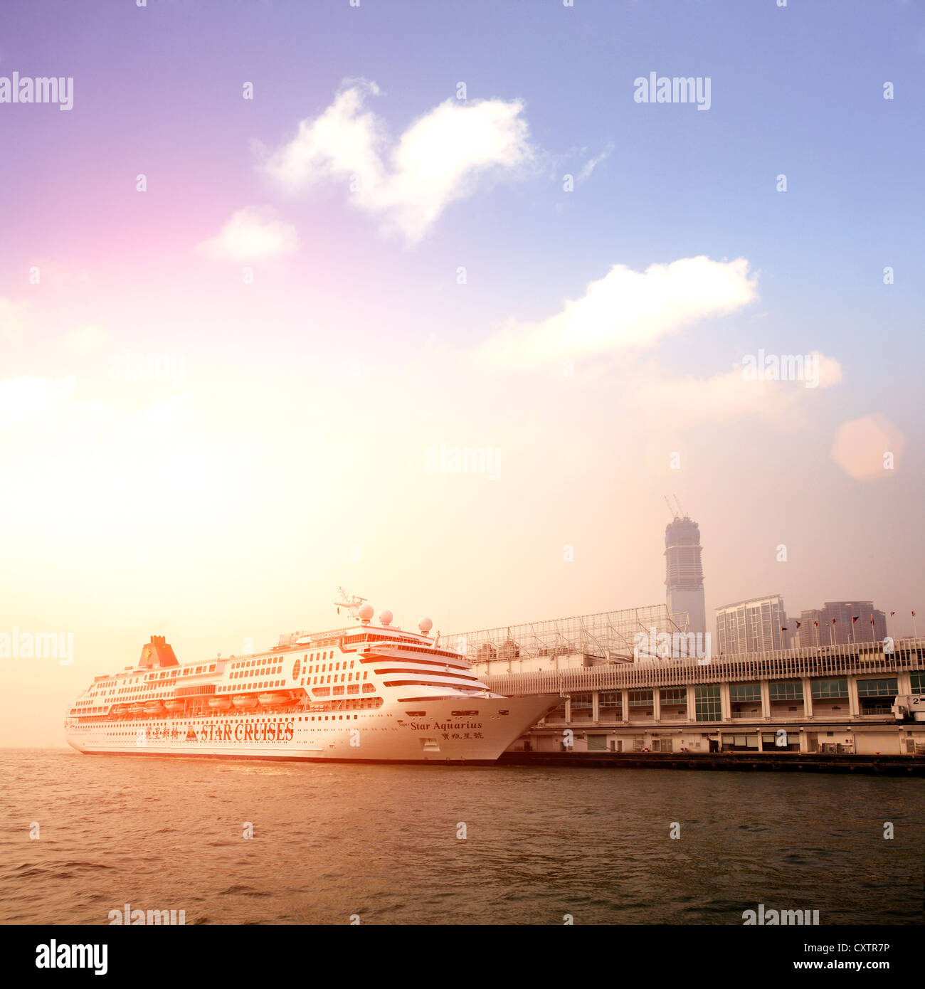 ship in Hong Kong Victoria bay with tall skyscraper Stock Photo - Alamy