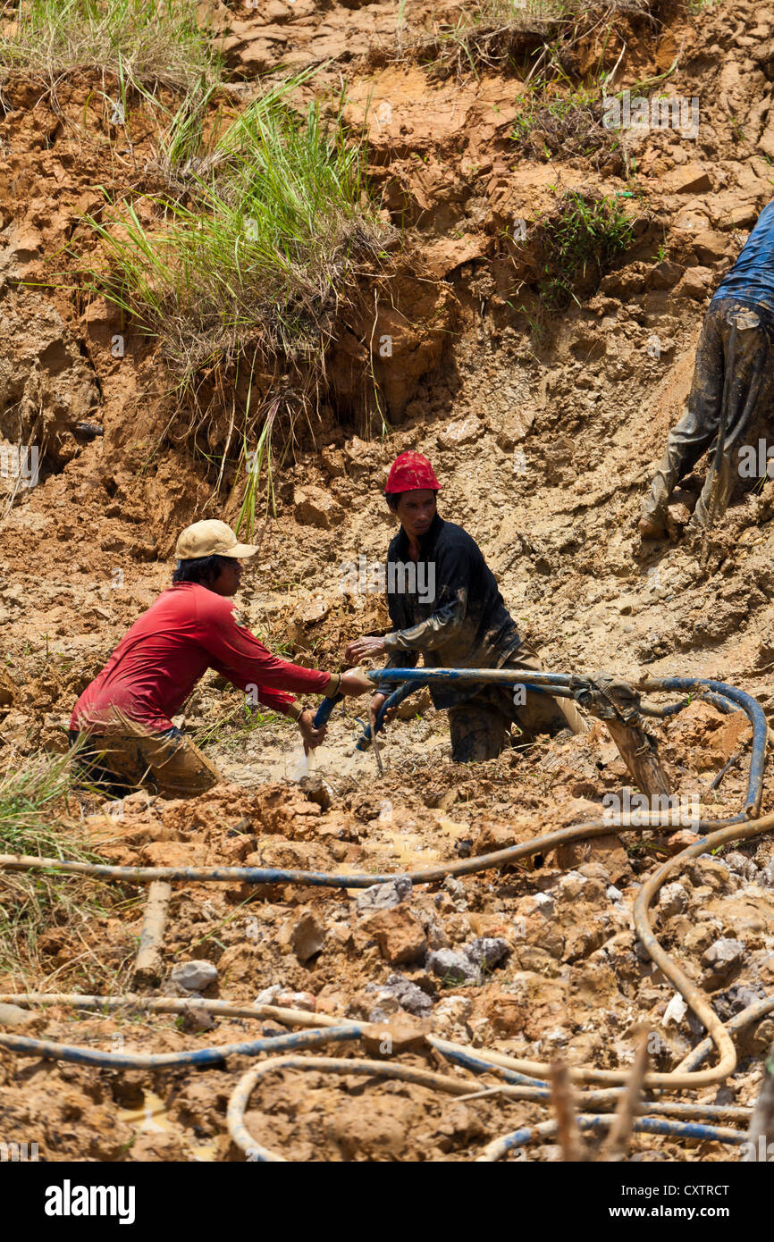 Diamond Diggers in a Pit on the Diamond Fields of Cempaka, Indonesia ...