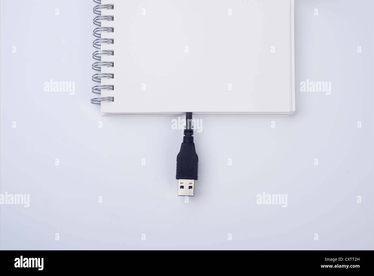 a notepad like a hexternal hard disk Stock Photo - Alamy