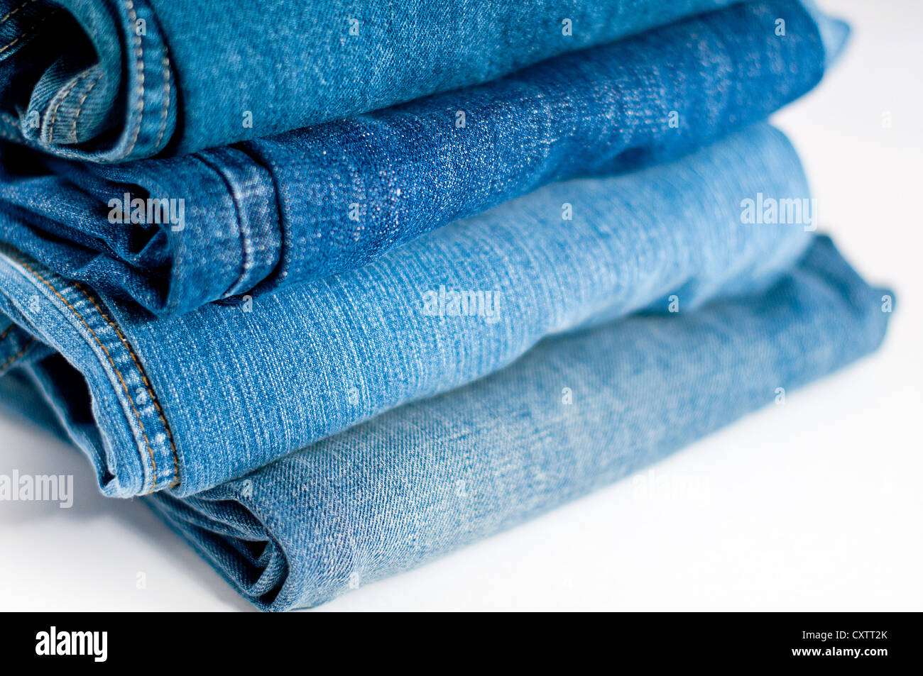 Stack of jeans Stock Photo - Alamy