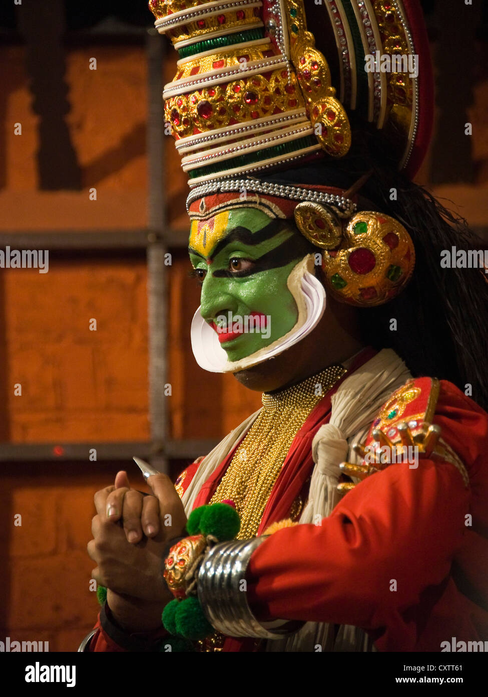 Vertical close up portrait of a Kathakali artist in full costume during ... Vertical close up portrait of a Kathakali artist in full costume during ...