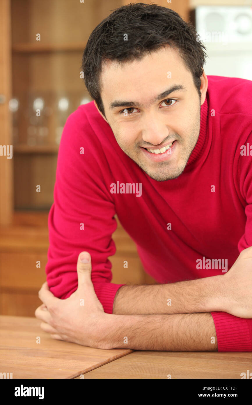 a smiling man in a kitchen Stock Photo - Alamy