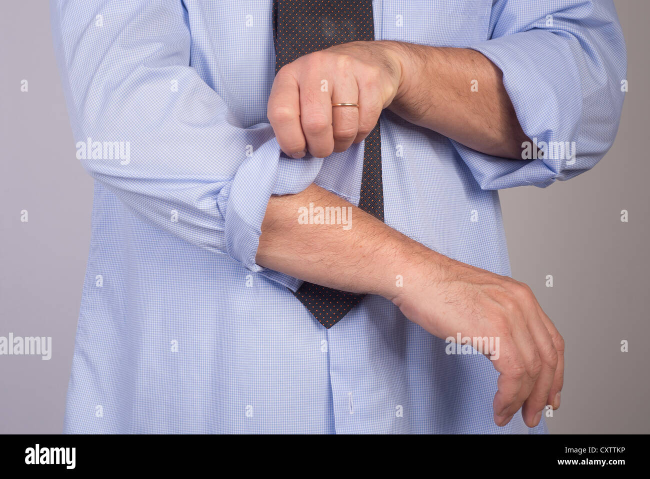 Roll up your sleeves hi-res stock photography and images - Alamy