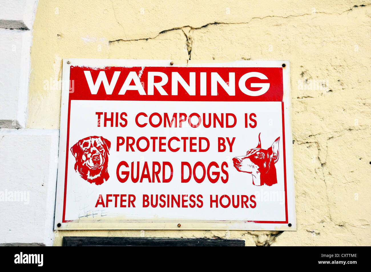 Guard dog sign, Nassau, Bahamas Stock Photo - Alamy