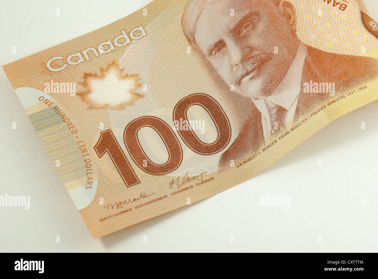 Hundred Canadian dollar bank note isolated on white background Stock ...