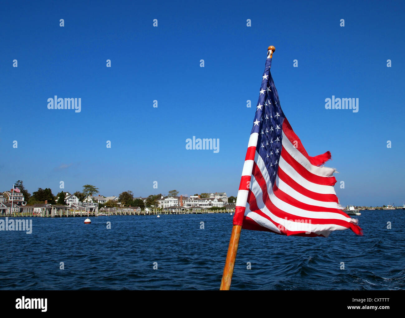 American flag blowing in the breeze, Edgartown, Martha's Vineyard ...