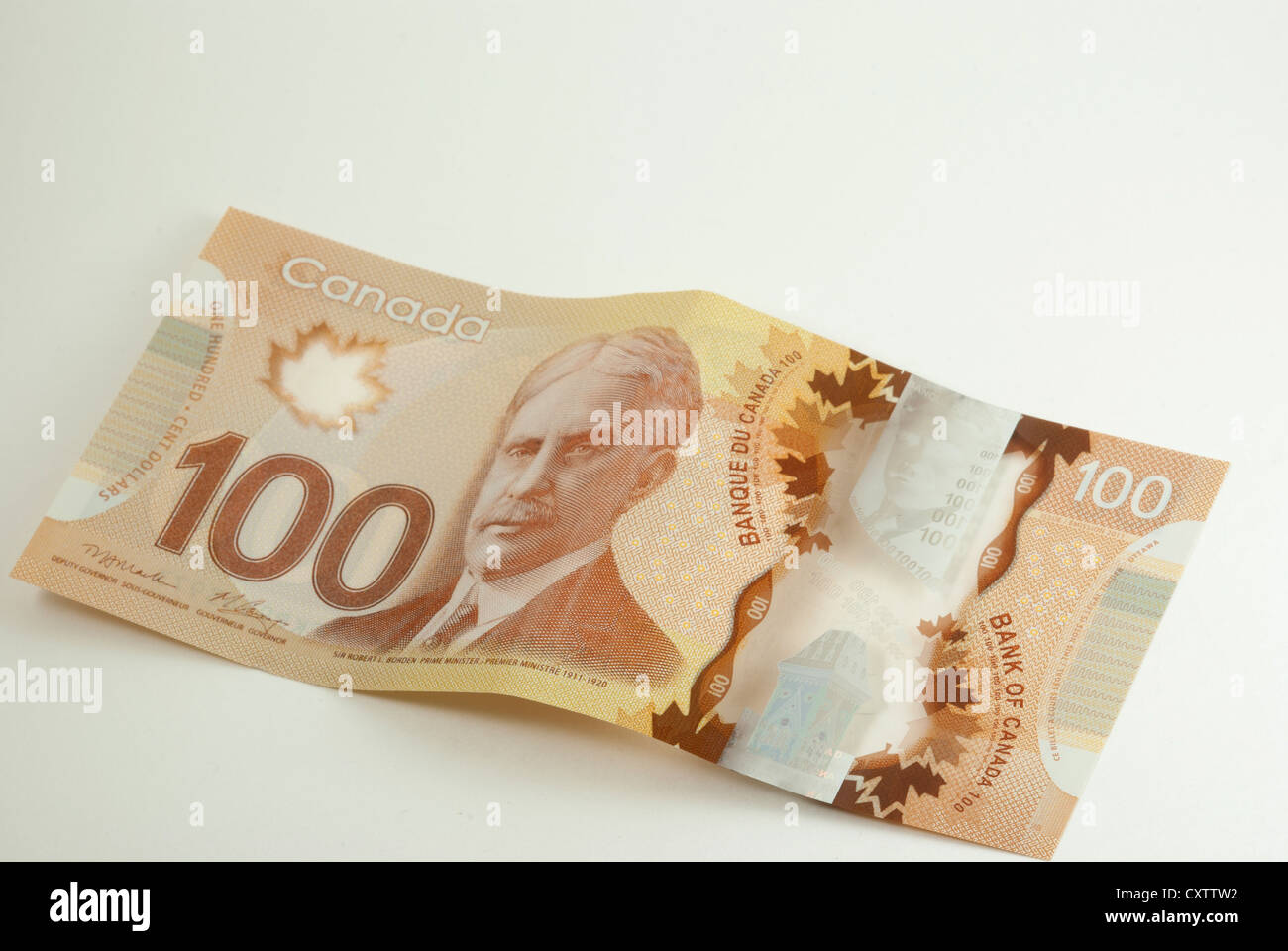 Hundred 100 Canadian dollar bank note isolated on white background ...