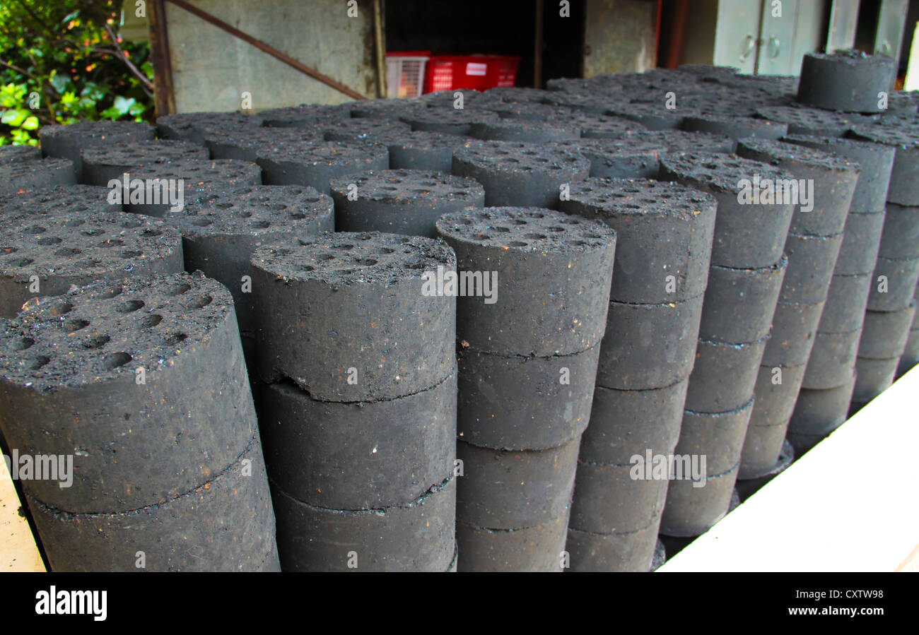 Blocks of charcoal as fuel for the kitchen at a hawker center in ...