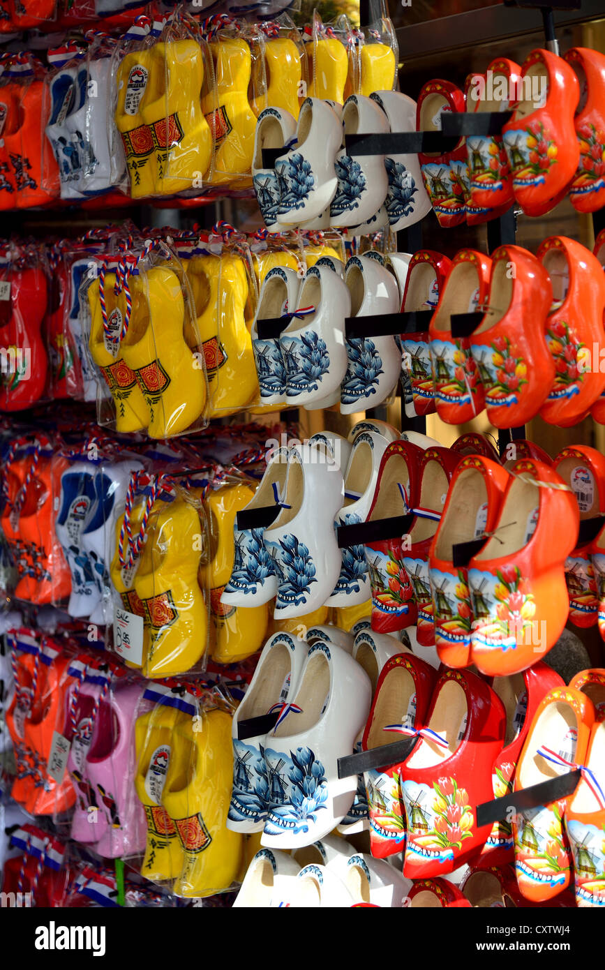 Colorfully painted Dutch wooden shoes in souvenir shop. Delft ...