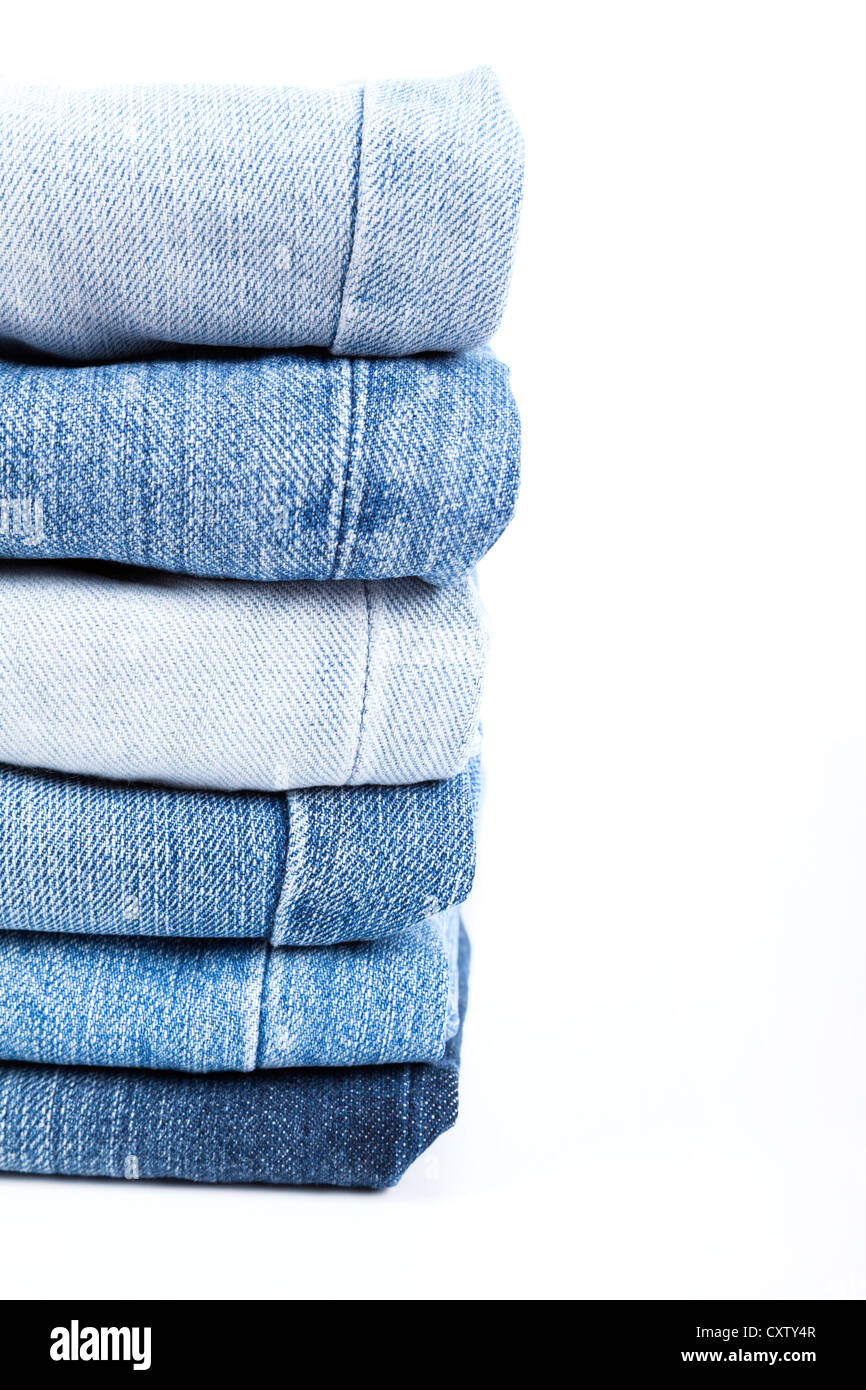 Pile of jeans Stock Photo - Alamy