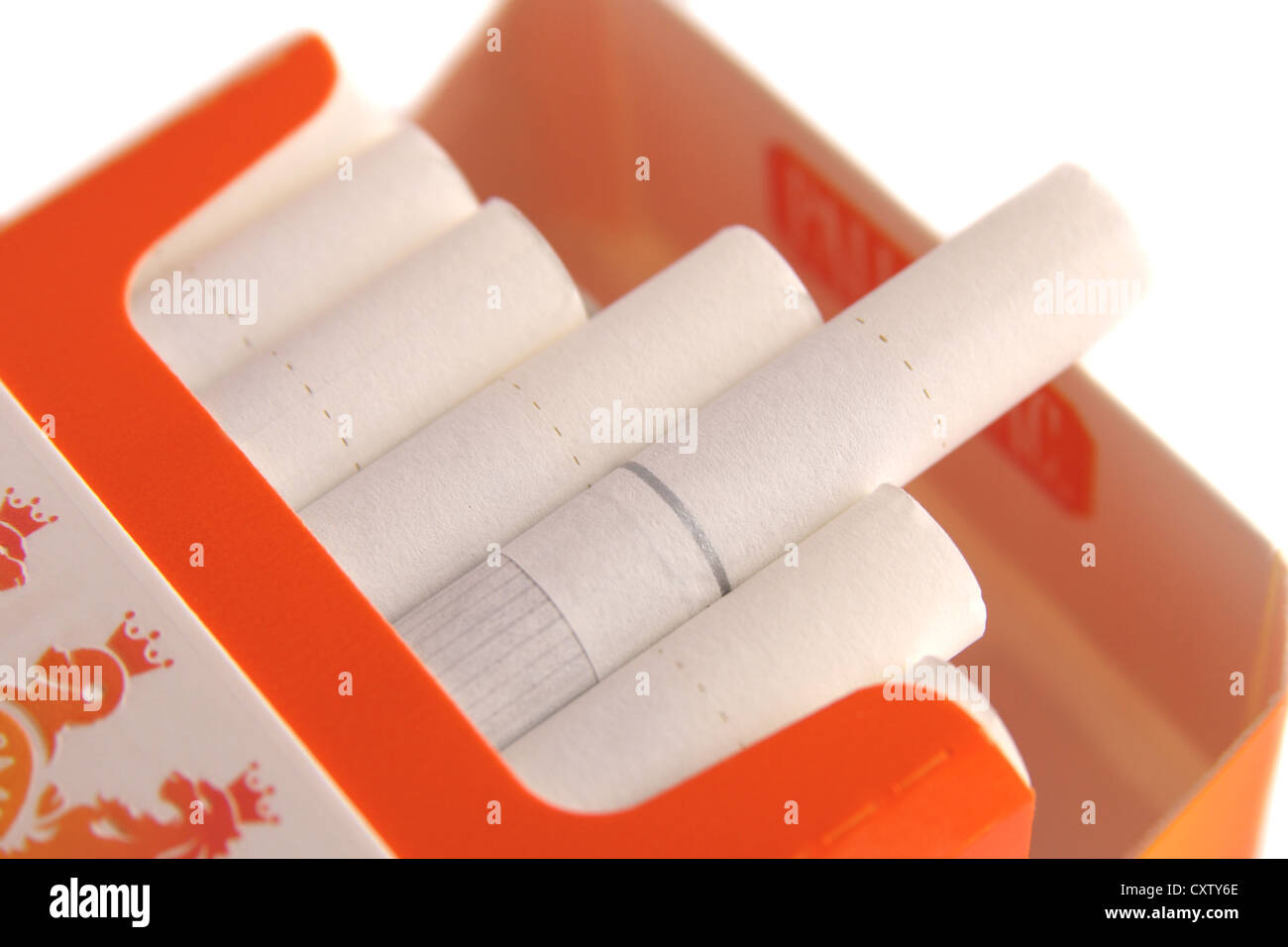 Close-up orange cigarette box on a white background Stock Photo - Alamy