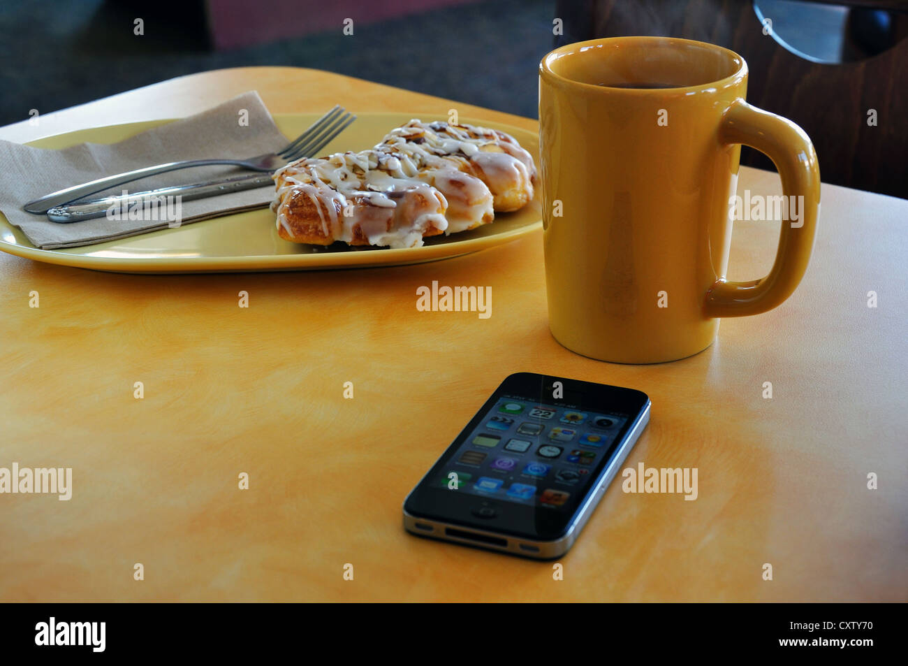 iPhone in cafe Stock Photo - Alamy