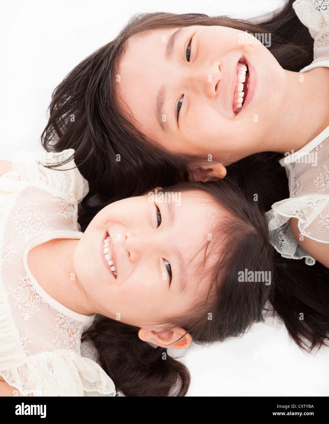 two happy asian girls Stock Photo - Alamy
