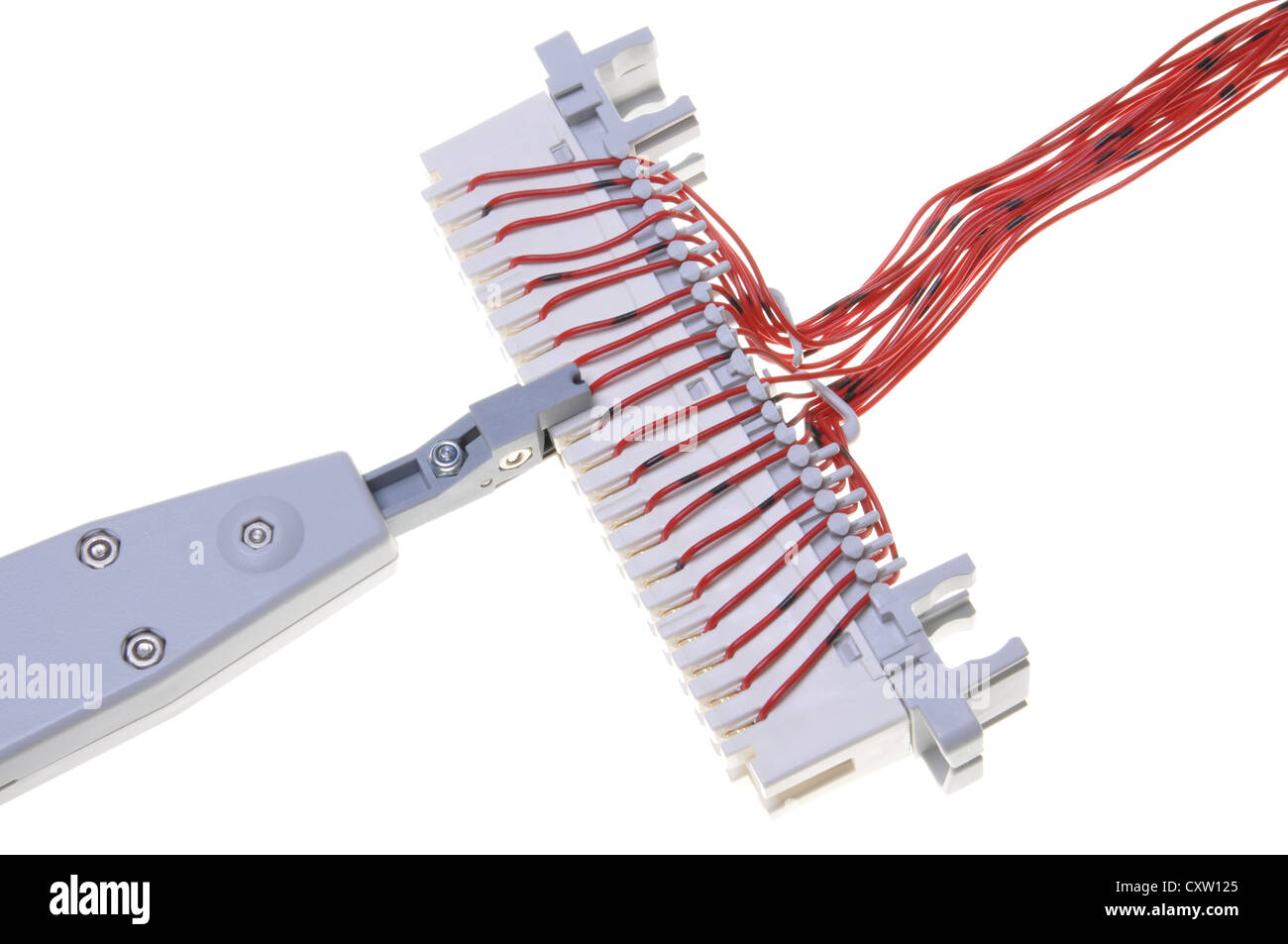 Telephone switchboard panel with punching tool Stock Photo - Alamy