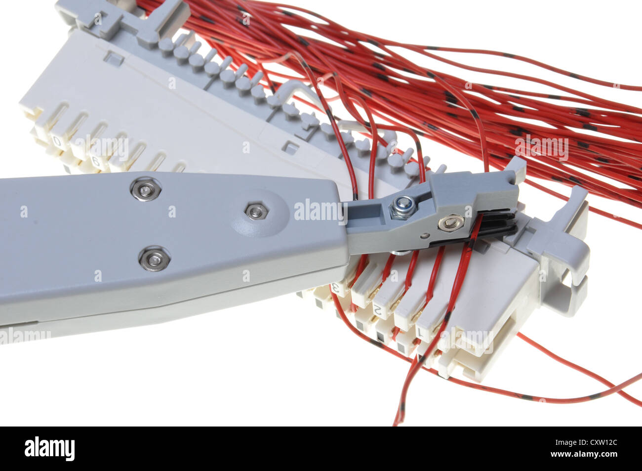 Telephone switchboard panel with punching tool Stock Photo - Alamy