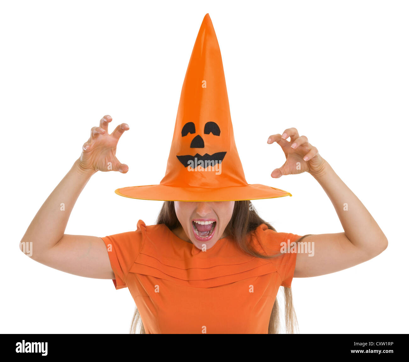 Woman in Halloween hat over eyes making scaring pose Stock Photo - Alamy
