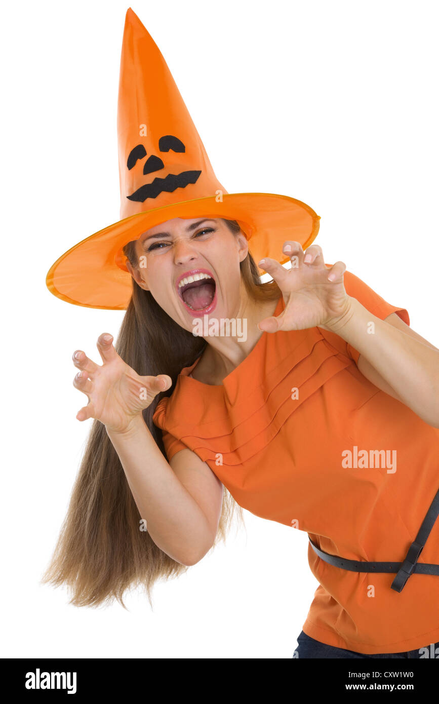 Woman in Halloween hat making scaring pose Stock Photo - Alamy