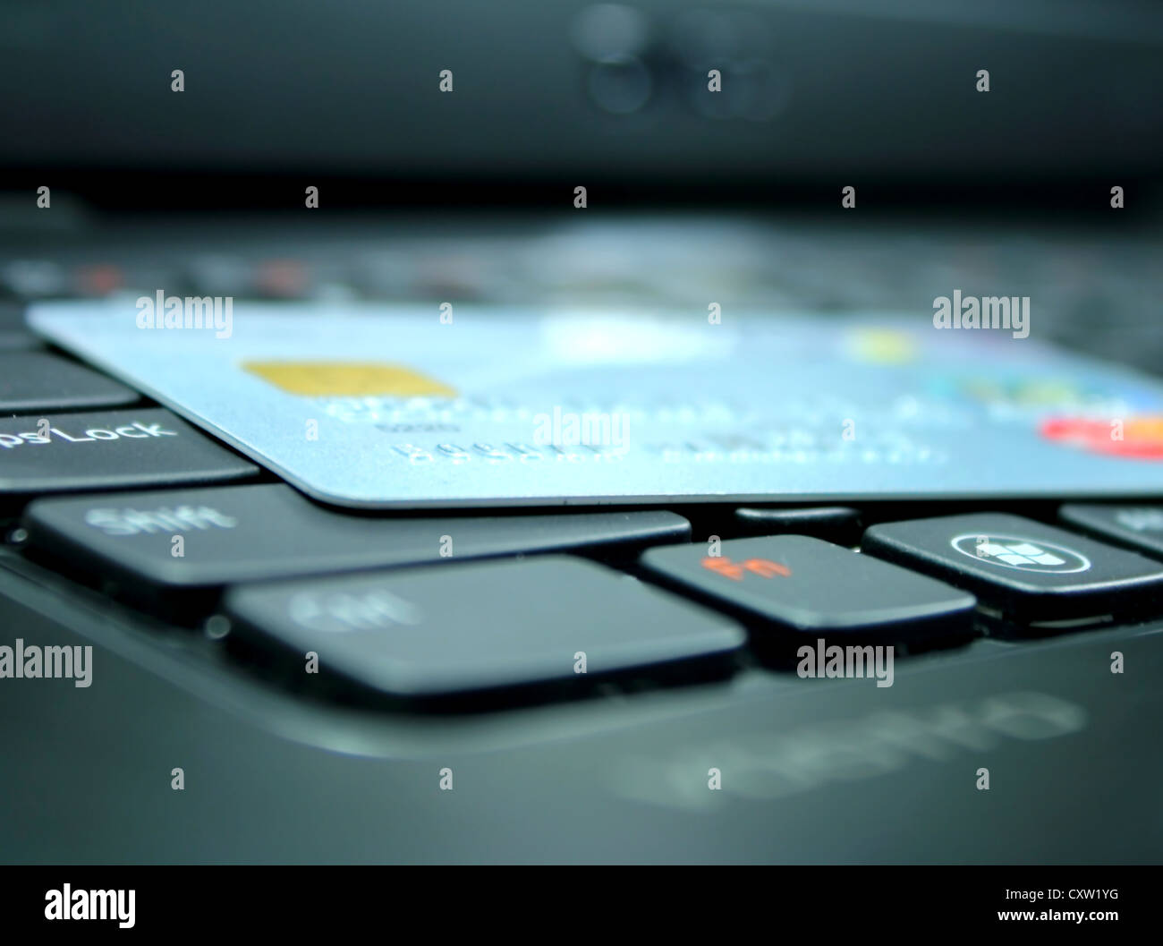 Credit card on the keyboard Stock Photo - Alamy