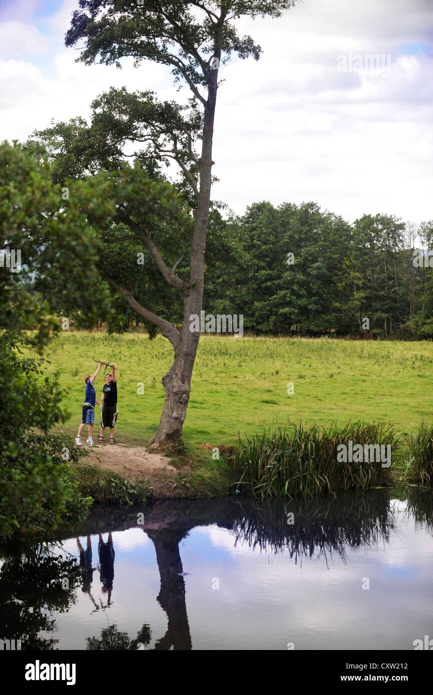 Riverside swing hi-res stock photography and images - Alamy