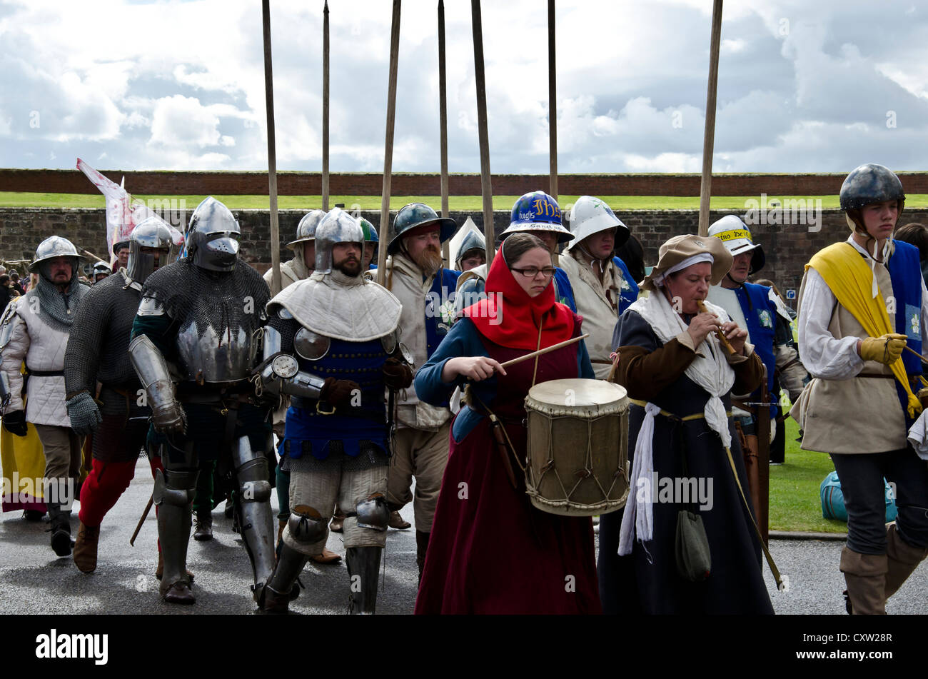 Men in medieval Scottish military dress at an historic event at Fort ...