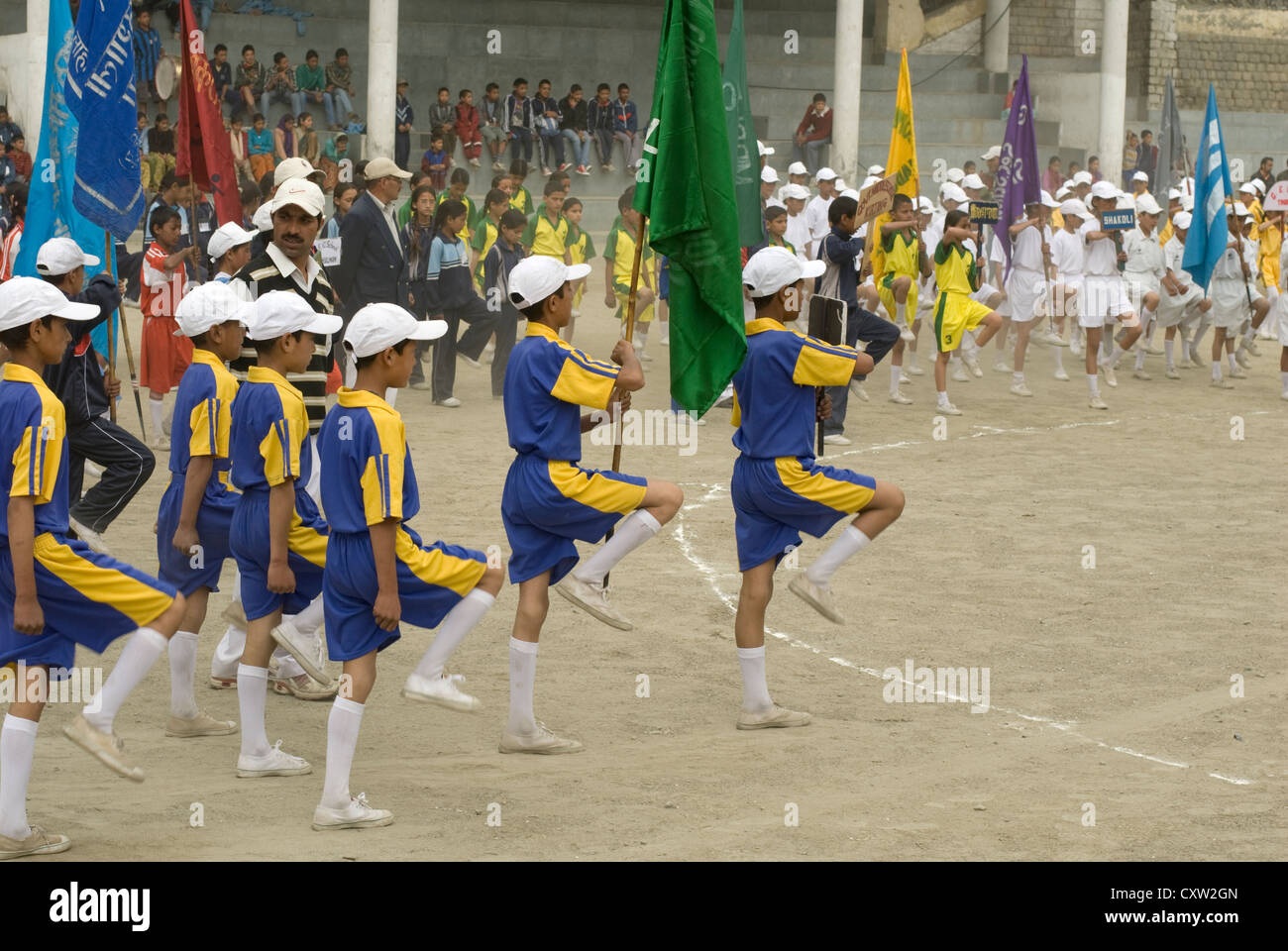 Children from different schools march during a sports opening ceremony ...