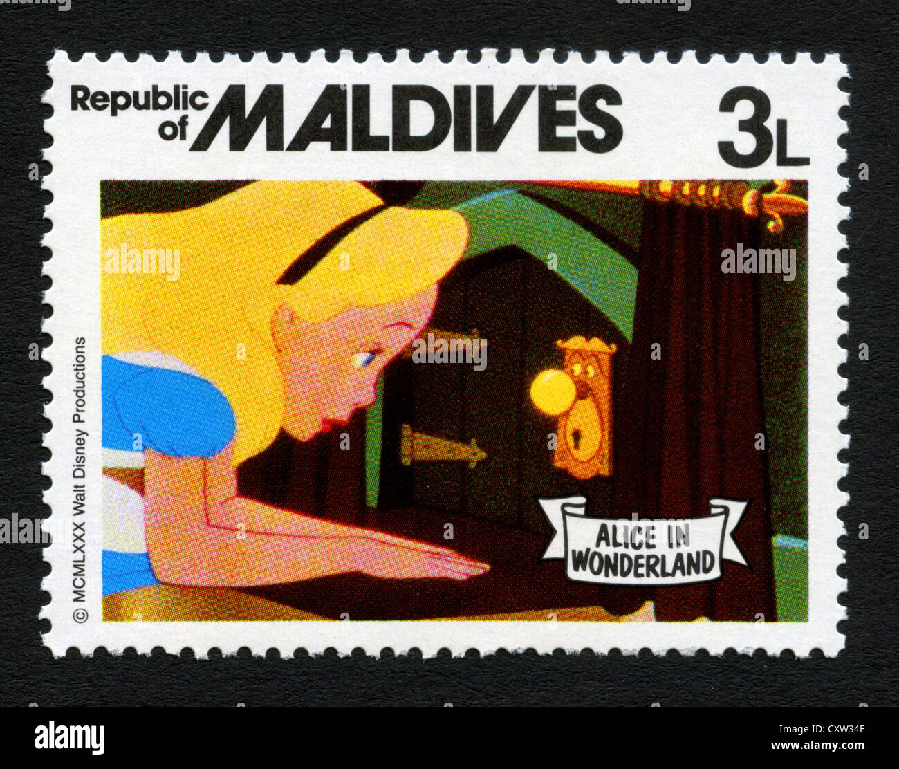 Maldives postage stamp - Alice in Wonderland cartoon Stock Photo - Alamy