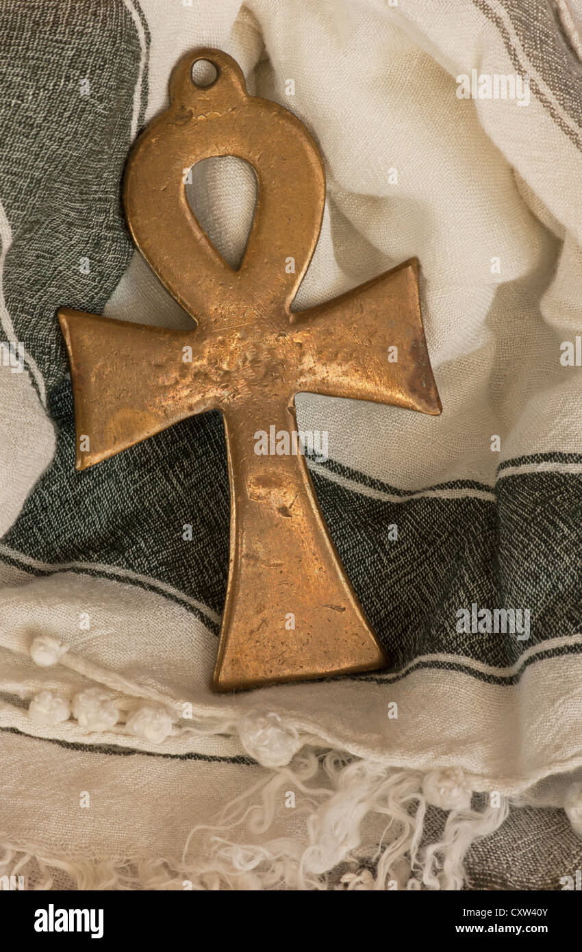 Egyptian ankh cross-like shape with kafia scarf background Stock Photo ...