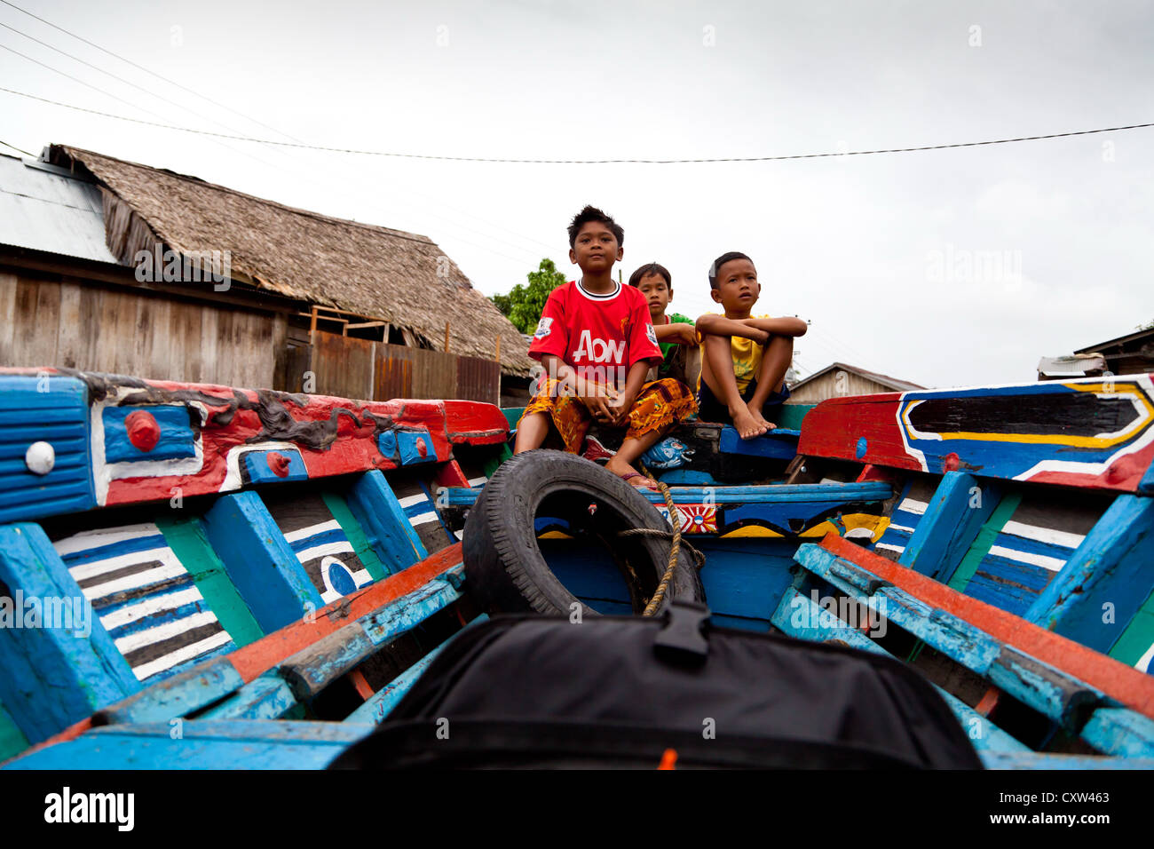 Joyful Boys on a River Boat in Banjarmasin, Indonesia Stock Photo - Alamy