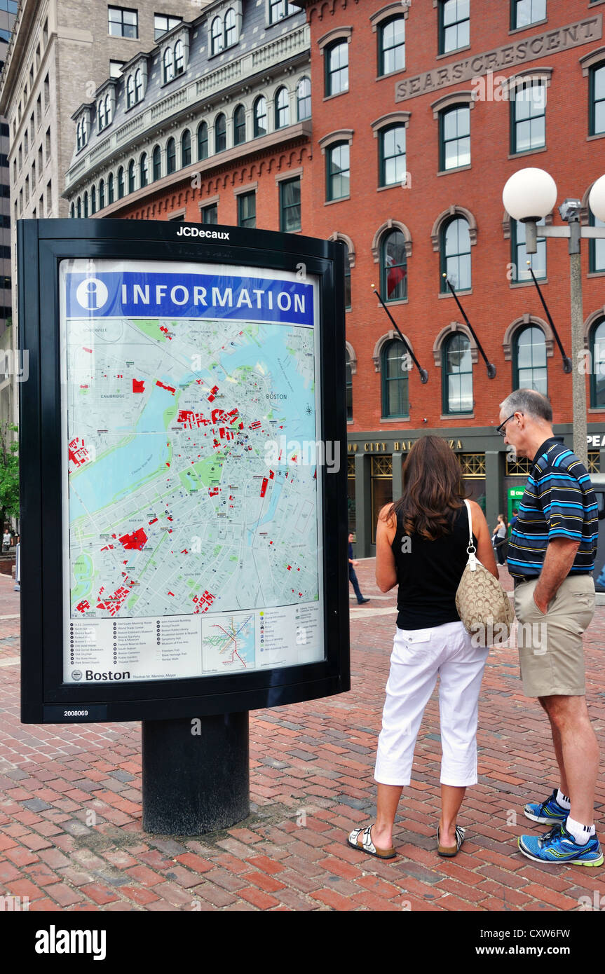 Tourists looking at an information map in Boston, Massachusetts, USA ...