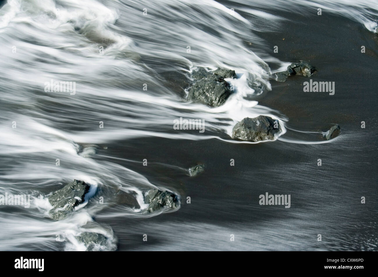 Blurred Water on Beach Stock Photo - Alamy