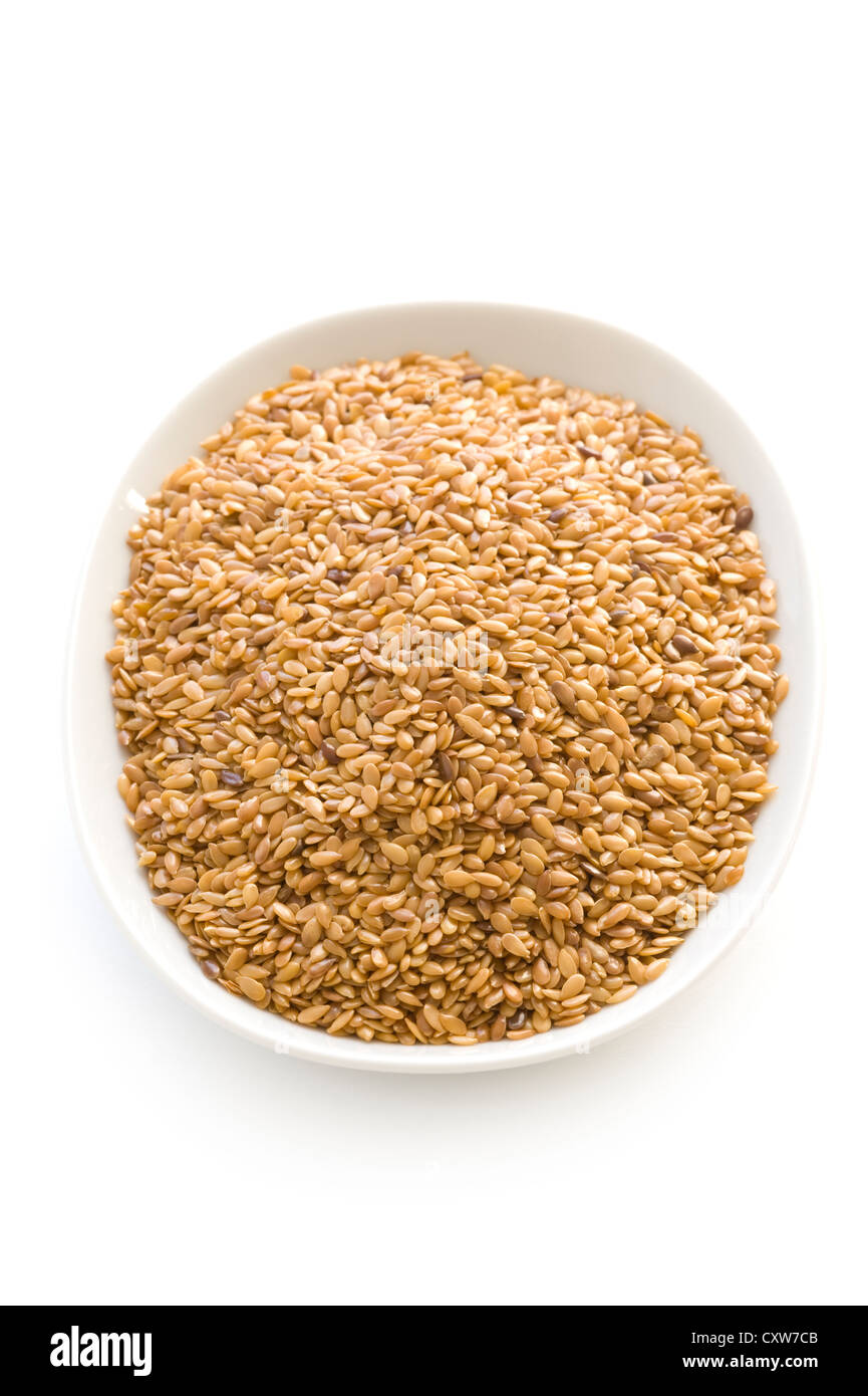 linseed or flaxseed in a dish isolated on a white background Stock Photo - Alamy