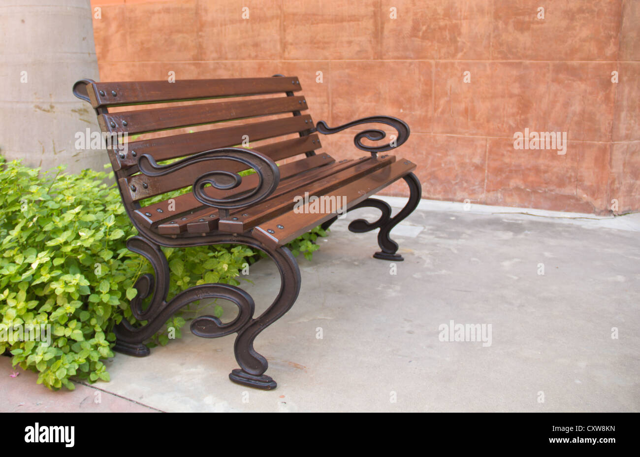 Bench brown in the park and relax Stock Photo - Alamy