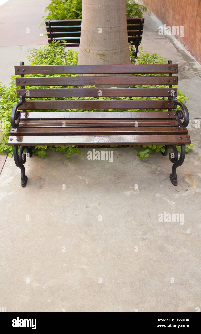 Bench brown in the park and relax Stock Photo - Alamy
