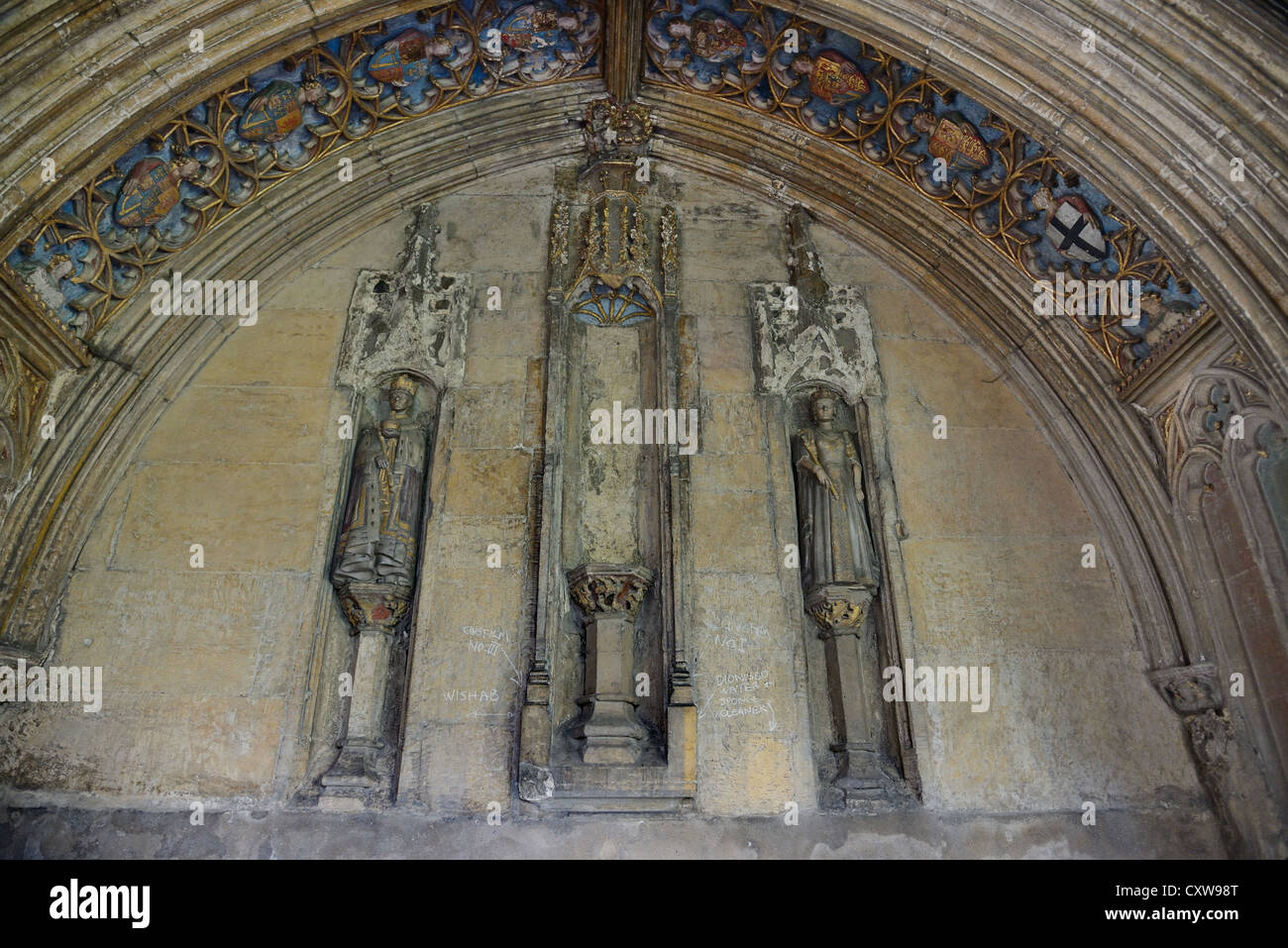 Norwich cathedral cloisters statues in recess Stock Photo - Alamy