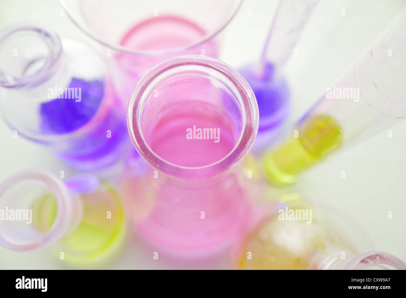 Laboratory glassware with various colored liquids Stock Photo - Alamy