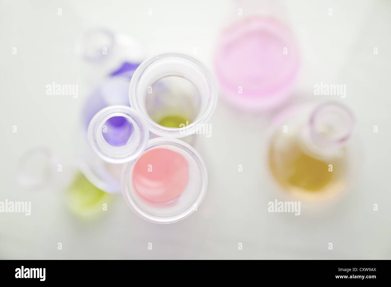 Laboratory glassware with various colored liquids Stock Photo - Alamy