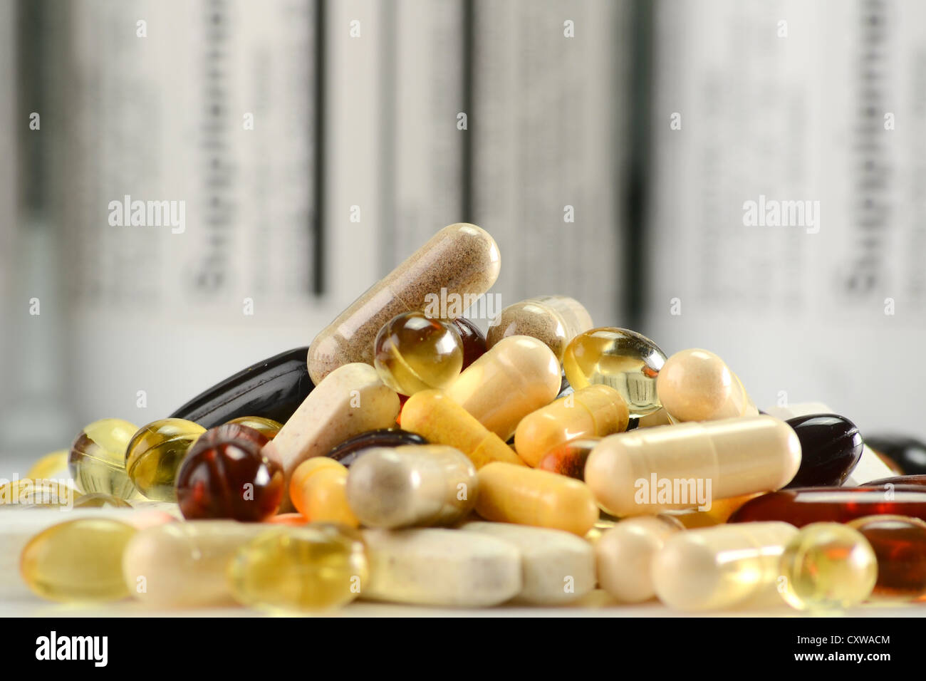 Composition with dietary supplement capsules and containers Stock Photo ...