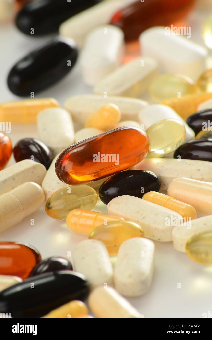 Composition with dietary supplement tablets Stock Photo - Alamy