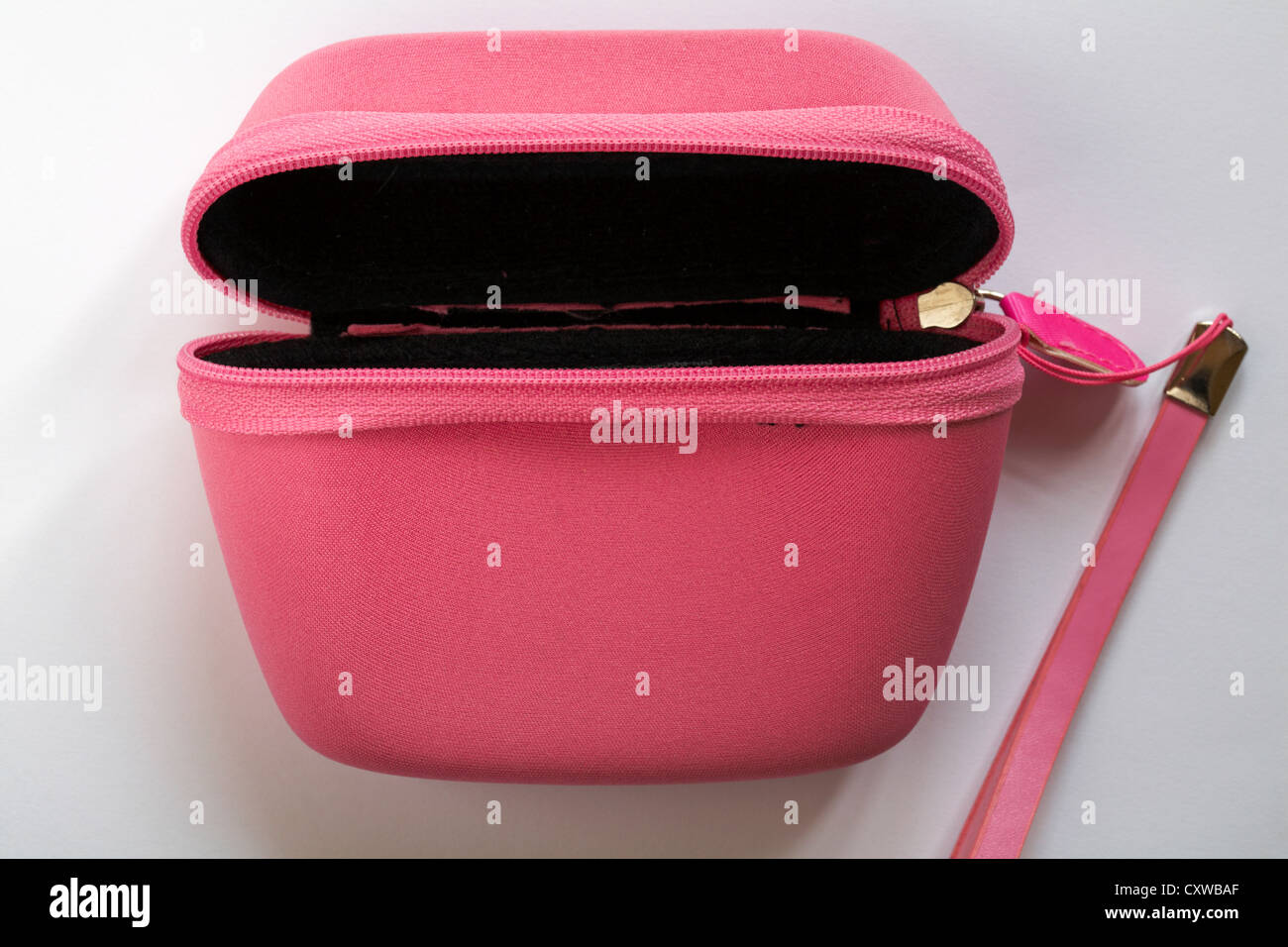 open zipped pink case with pink zip zipper isolated on white background ...