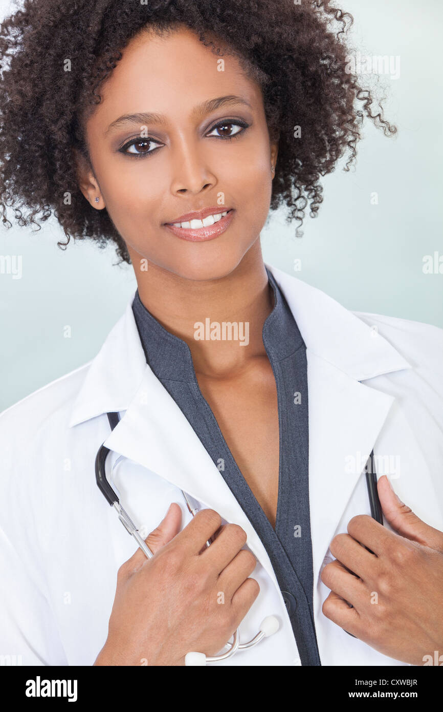 An African American female medical doctor with a stethoscope in ...